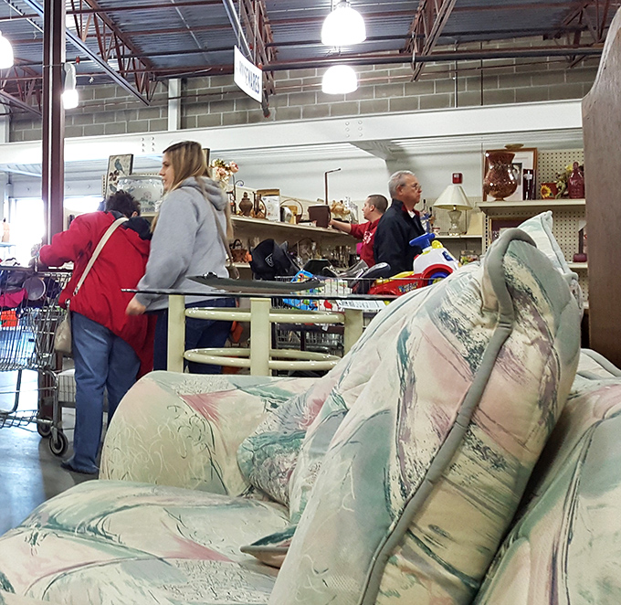 Treasure hunters in their natural habitat, scanning shelves for that perfect something they didn't know they needed until now.