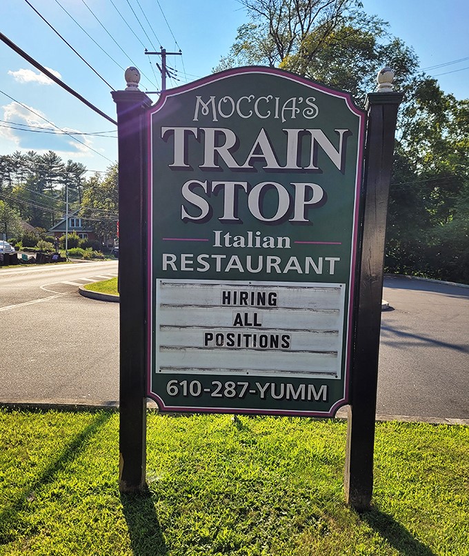 The sign doesn't just announce the restaurant&mdash;it promises a delicious detour from your regular routine with that perfect phone number: YUM-M.