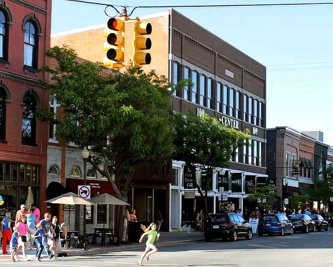 South 2nd Avenue after a fresh snow, where shopkeepers have cleared paths to welcome visitors into their warm, inviting stores.