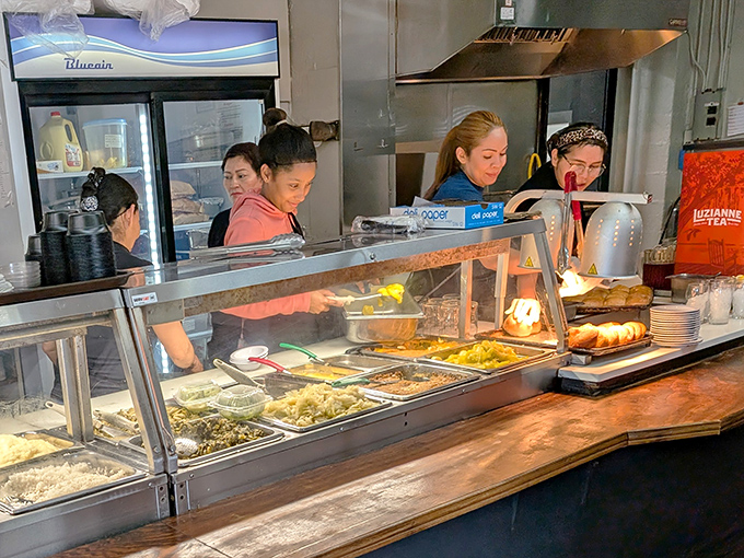 The serving line staff&mdash;culinary gatekeepers who know exactly how much gravy constitutes "a little extra" for each regular customer.