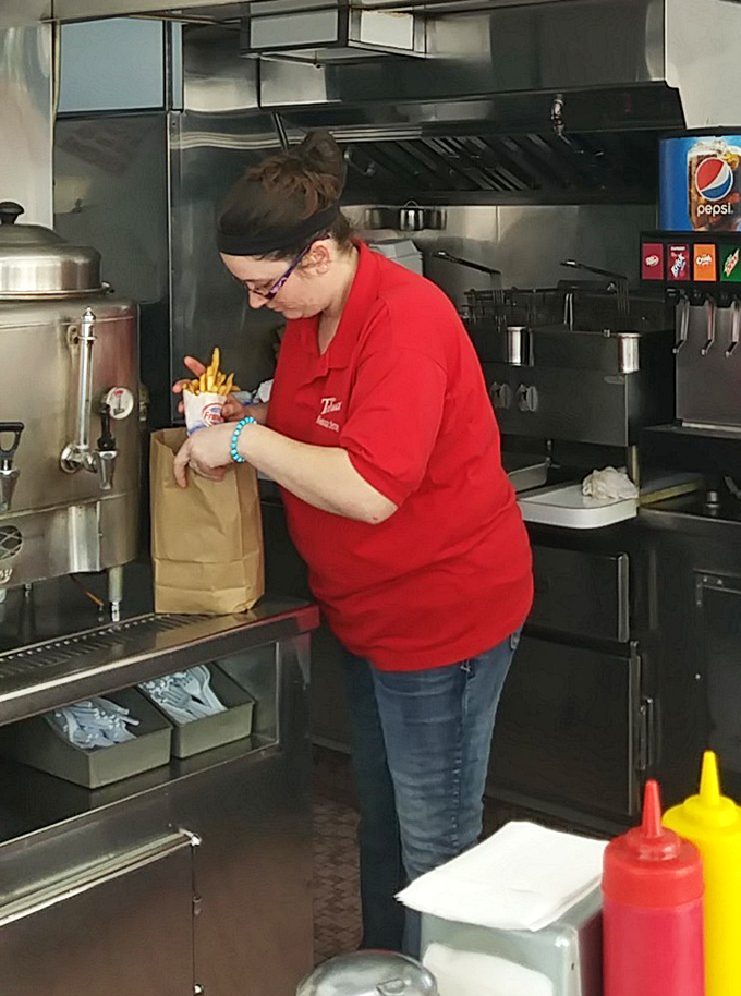 Behind every great burger joint is a dedicated team member who treats each paper bag like it contains someone's moment of joy.