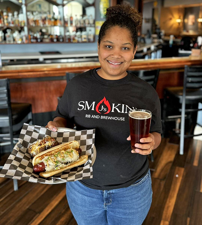 Genuine hospitality served alongside craft beer and loaded sausages. That smile says "I'm about to make your day significantly better."