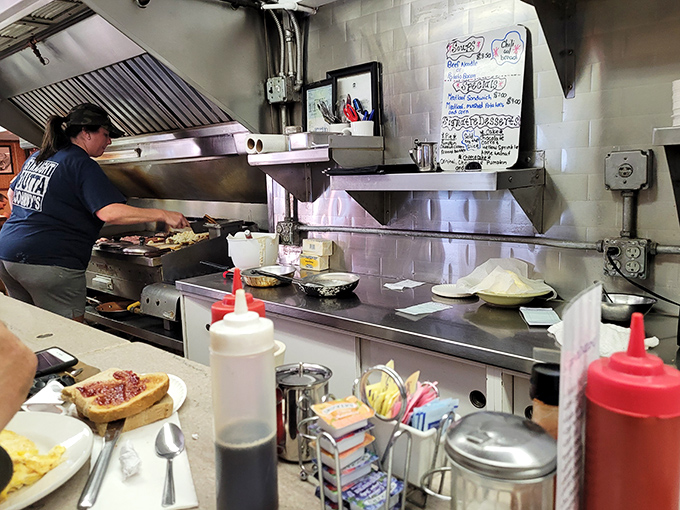 Where breakfast magic happens. The open kitchen at Johnny's lets you witness the choreography of short-order cooking that's becoming a lost art.