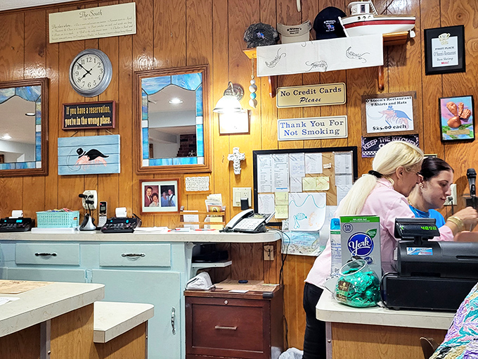 Efficient staff keeping the operation running smoothly while hungry diners wait eagerly for their legendary seafood fix.