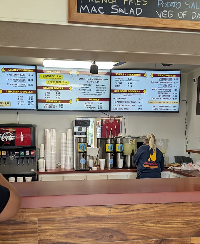 Behind the counter, the crew runs the show with practiced rhythm—a reminder that great chicken starts with great people.