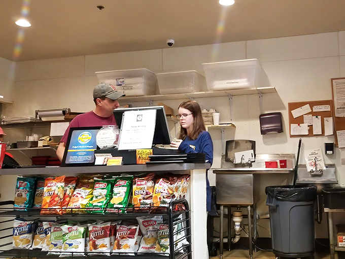 The unsung heroes behind the counter, crafting happiness one sandwich at a time.