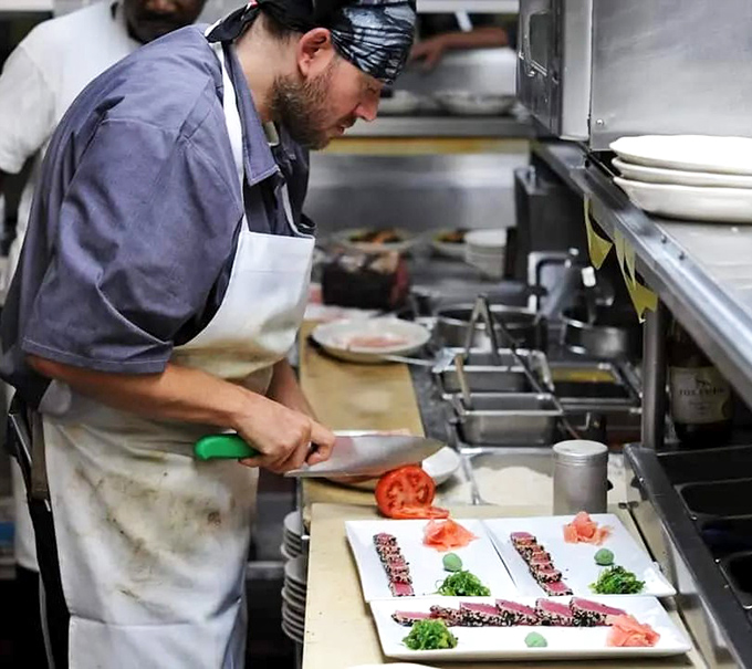 Behind the scenes magic: where skilled hands transform raw ingredients into the plates that make memories. Culinary choreography at its finest.