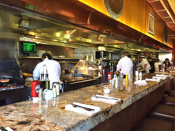 The open kitchen isn't just functional &ndash; it's dinner theater where chefs perform the ancient art of turning ingredients into memories.