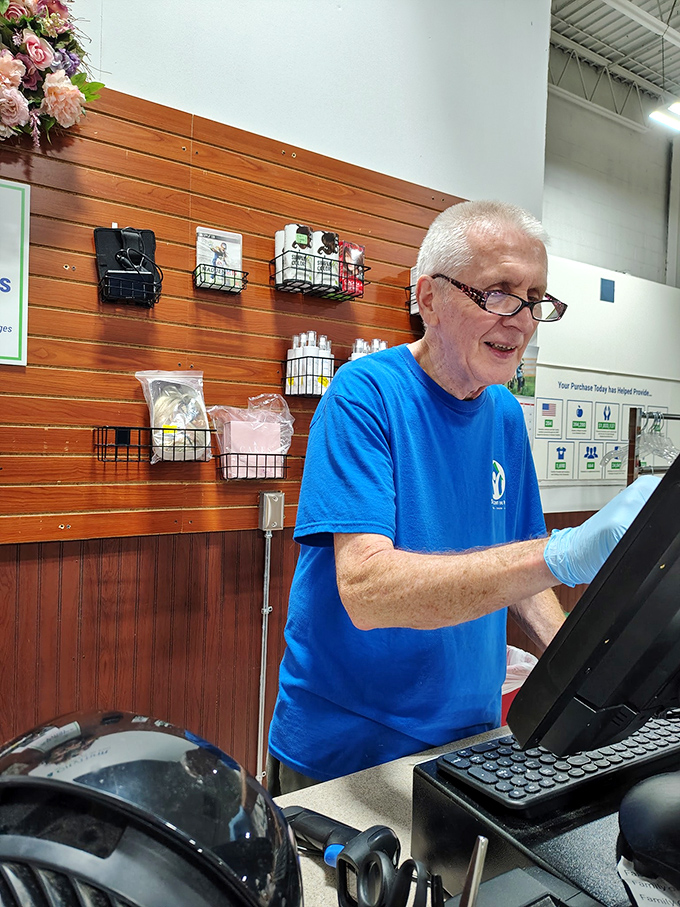 Behind every great thrift store is dedicated staff&mdash;this cheerful volunteer embodies the spirit of service that powers St. Vincent de Paul's mission.