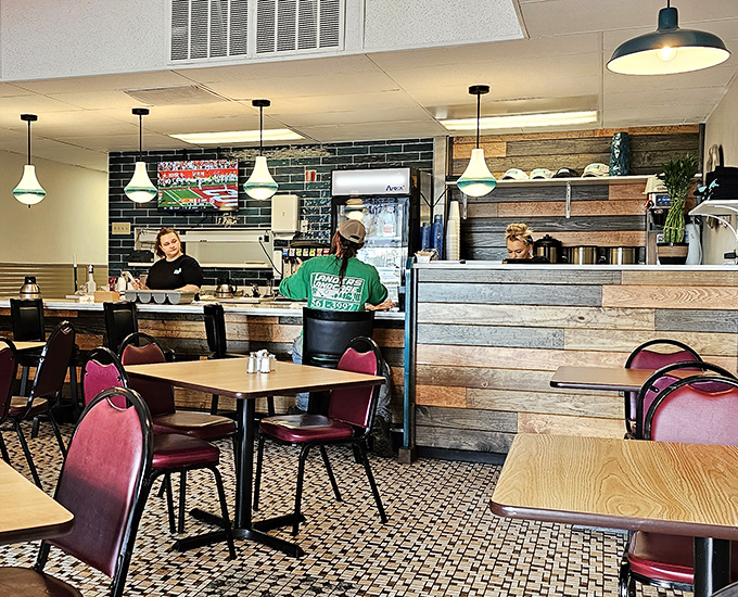 Where diner magic happens&mdash;staff working their breakfast choreography behind a counter that's seen thousands of coffee refills and "order up!" calls.