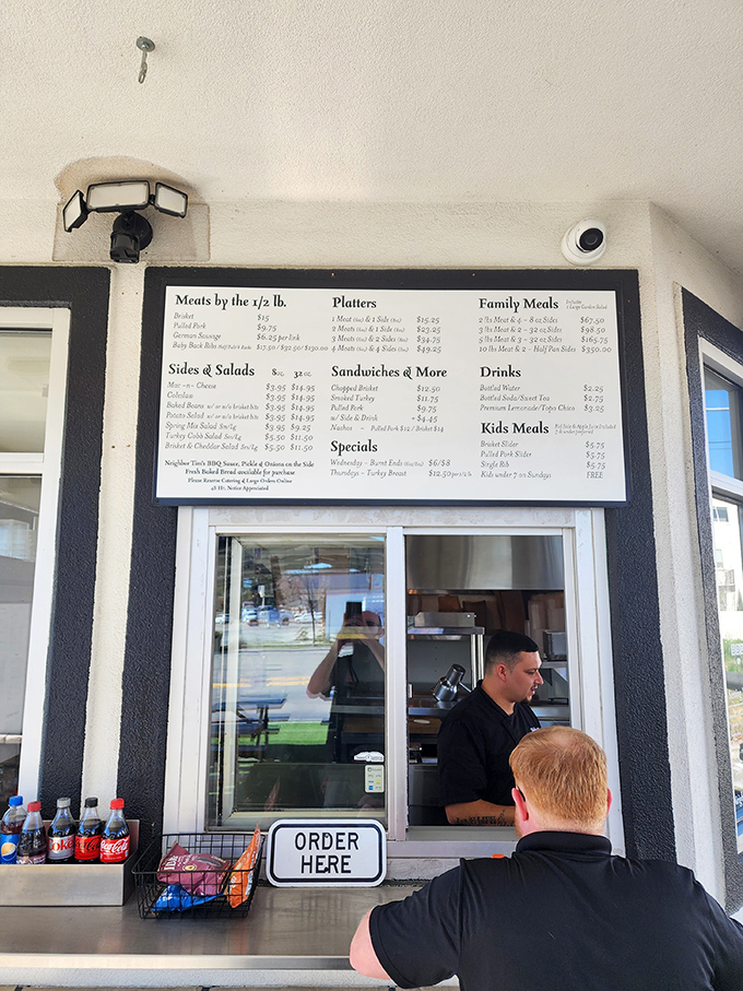 Where BBQ dreams become reality. The exchange at this window is simple: money for meat magic, no complicated handshakes required.