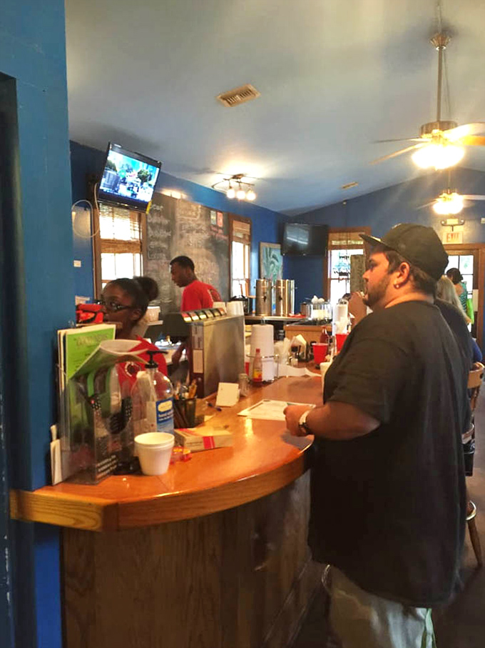 The magic happens here, where smoke-whisperers transform ordinary meat into extraordinary memories, one order at a time.