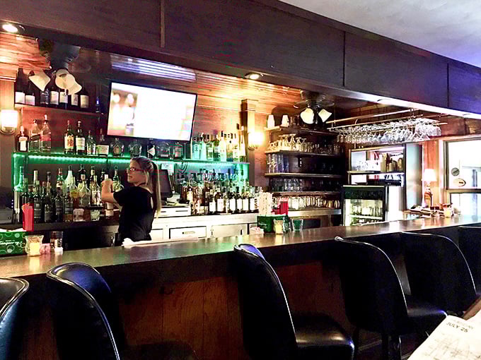 Where the magic happens: the bar area where orders are taken, jokes are shared, and drinks are crafted with practiced hands.