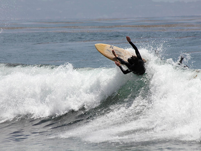 Surfers know Leo Carrillo offers consistent breaks without Zuma's crowds. This wave rider caught the perfect curl on a quintessential California day.
