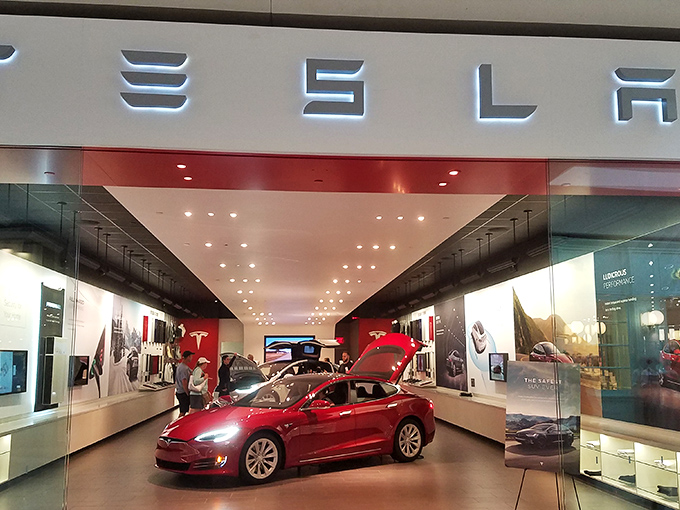 Tesla's showroom gleams with automotive desire&mdash;where window shopping takes on new meaning as you pretend you're just "gathering information" about that Model S.