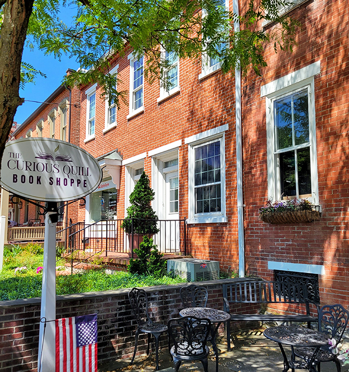The Curious Quill Book Shoppe offers literary treasures and outdoor seating where readers can savor both stories and sunshine simultaneously.