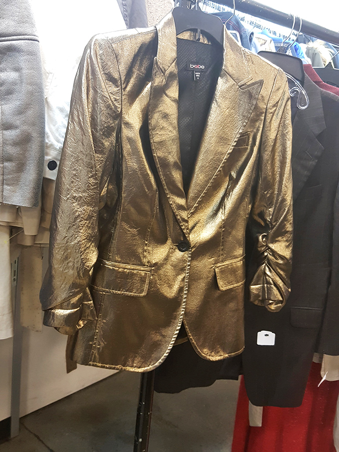The gold blazer that screams "I'm the most interesting person at this party." Designer labels hide in plain sight for eagle-eyed fashionistas.