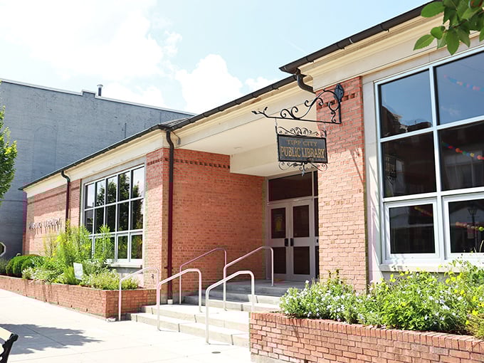 The Tipp City Public Library welcomes readers with classic brick charm and flowering gardens &ndash; because every good story deserves a beautiful setting.