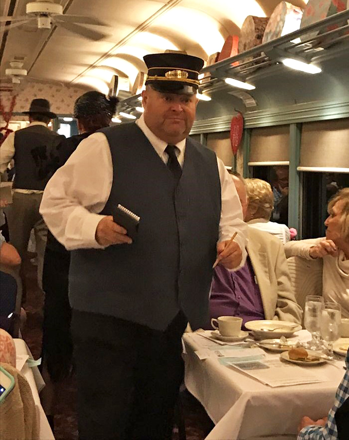 All aboard for mystery! The conductor isn't just staff&mdash;he's part of the immersive experience, setting the stage for theatrical dining.