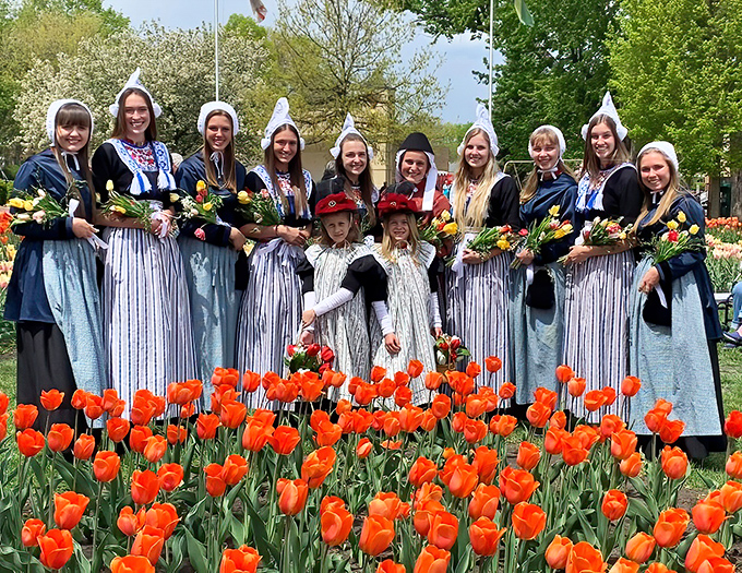 Tulip Time Festival transforms Pella into a photographer's dream, with traditional costumes as colorful as the flowers.