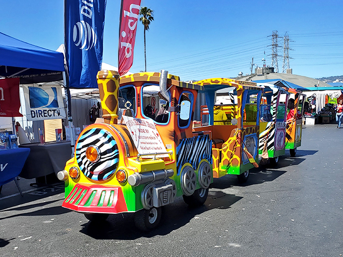 All aboard the whimsy express! This colorful trackless train brings smiles to young faces while giving parents' feet a much-needed break.