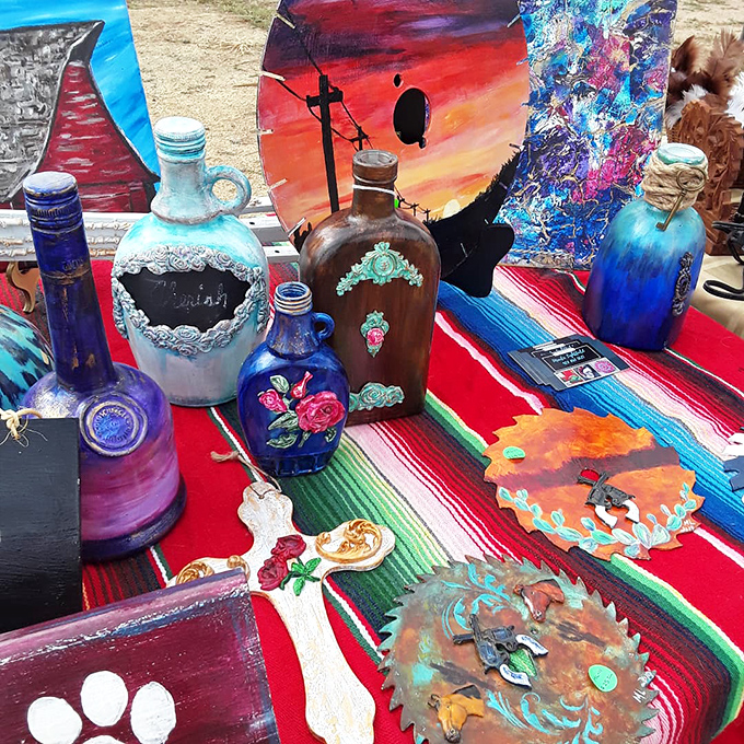 Southwestern artistry explodes across this table, where painted bottles and desert-inspired crafts capture Arizona's soul in portable form.