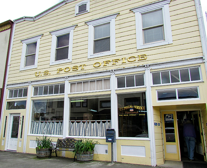 The Post Office: where mail and history get delivered daily. That golden lettering announces its purpose with the confidence of a bygone era when receiving letters was an event.