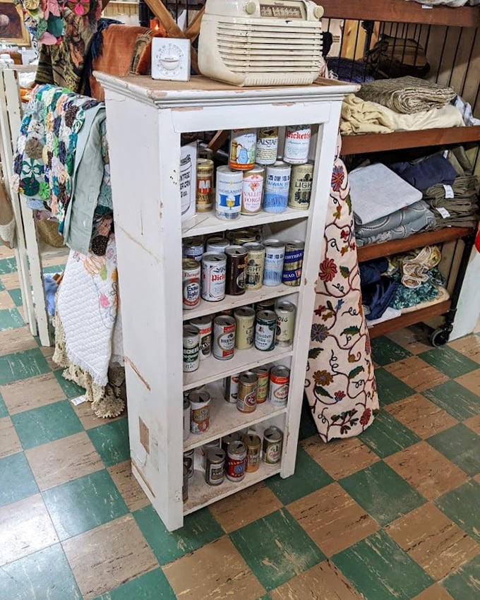 A shrine to vintage advertising that doubles as practical storage. Those old beer cans tell more stories than most history books&mdash;and look better doing it.