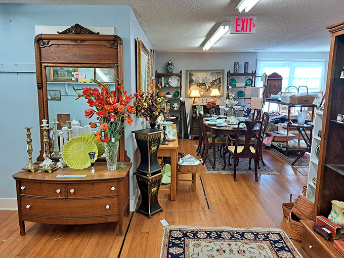 Warm wooden tones and fresh flowers transform this corner into a vignette so inviting you'll want to move in&mdash;or at least recreate it at home. 