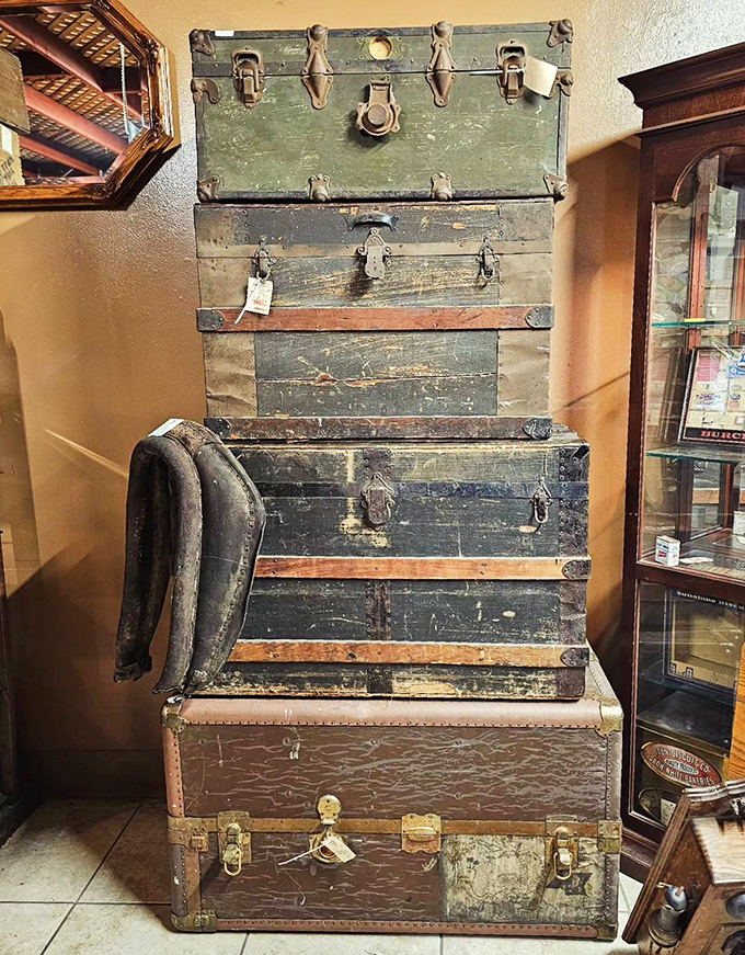Stacked vintage trunks that have seen more of the world than most modern travelers. Each scratch and dent is a passport stamp from another era.