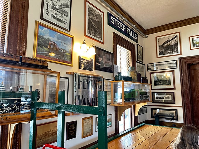 Railroad history covers these walls like the world's most fascinating wallpaper. Each frame tells a story of innovation, adventure, and American ingenuity.