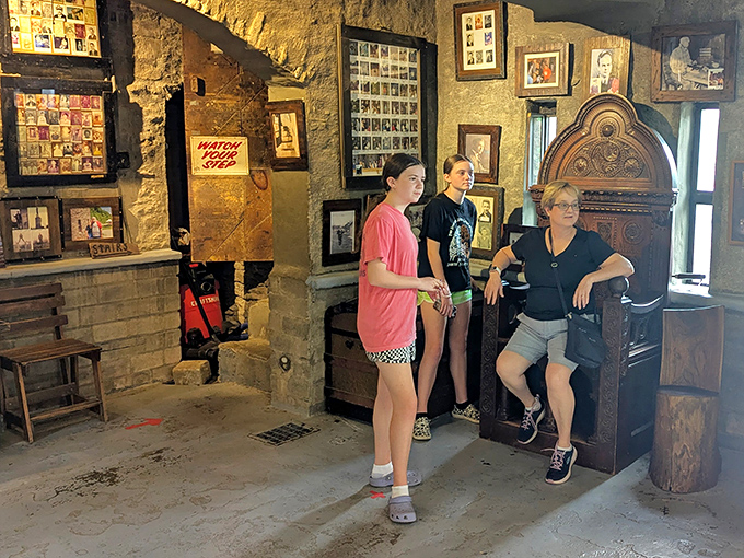 Visitors explore the castle's interior, discovering historical treasures and architectural details that transport them centuries back in time.