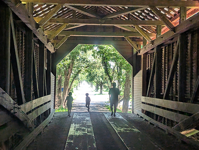 Generations sharing footsteps across the same wooden planks. Some family outings create memories that echo for decades.