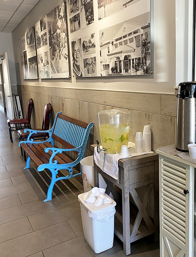 The waiting area features historical photos and refreshing lemonade &ndash; turning what could be impatience into an opportunity to absorb the restaurant's character.