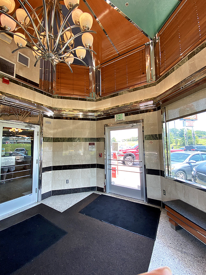 The entrance makes a statement: "Prepare for grandeur!" That chandelier isn't just lighting&mdash;it's jewelry for the ceiling.