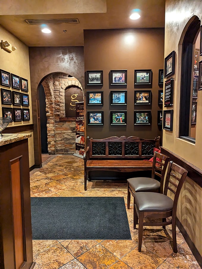 The waiting area's photo wall tells stories of community connections &ndash; a visual reminder that in Italian culture, restaurants aren't just places to eat, but to belong.