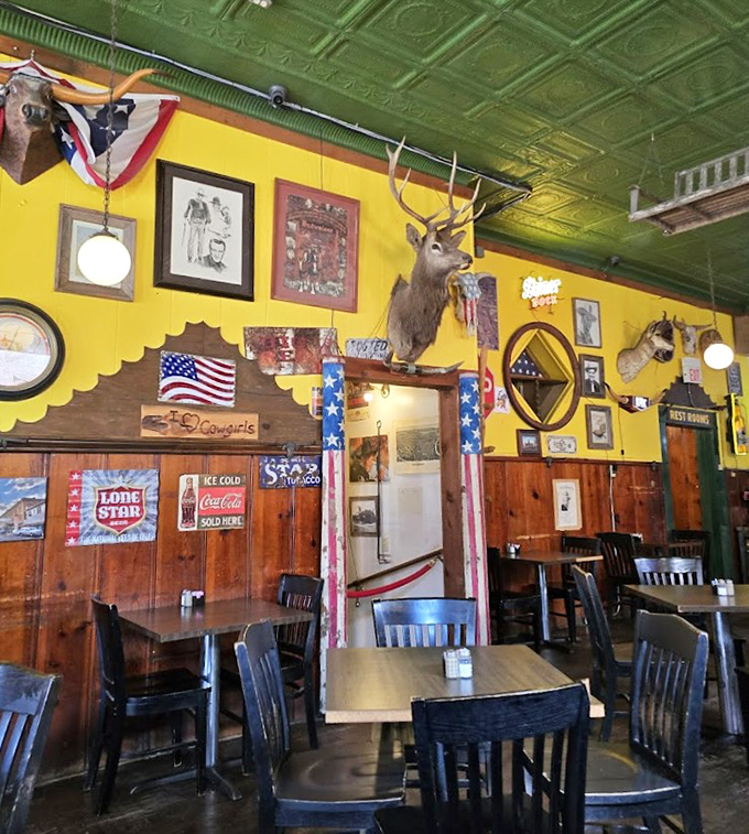 Yellow walls, green ceiling, mounted deer head&mdash;this isn't interior design, it's a Texas personality test. And everyone passes.