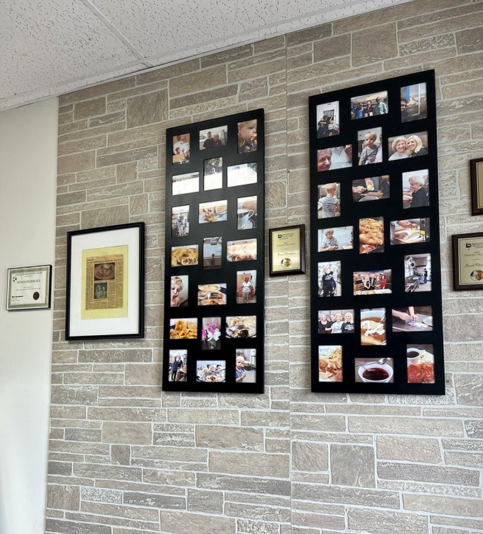 The wall of memories tells stories of satisfied customers and community connections. This is a place that matters to people.