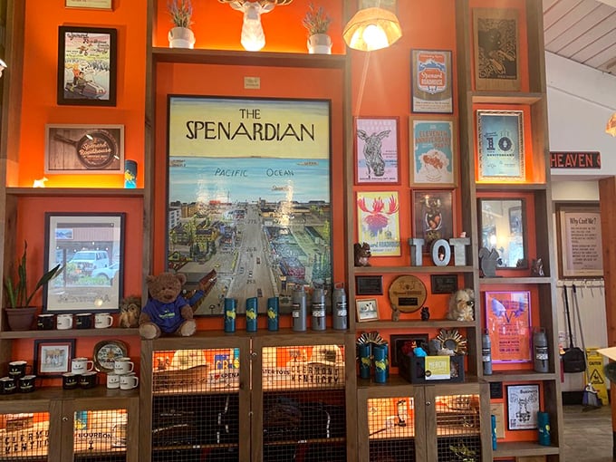 The wall display showcases "The Spenardian" amid local art and memorabilia. It's a visual love letter to the neighborhood's quirky, creative spirit.