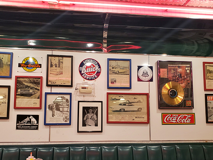 The wall decor tells stories of American highways, classic cars, and simpler times when diners were the original social networks.