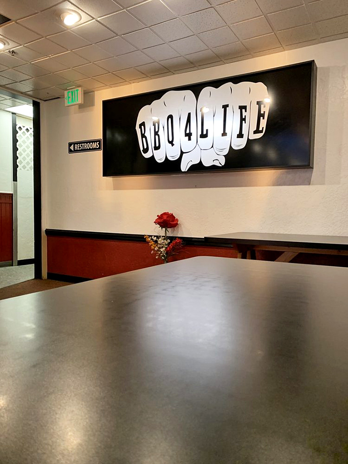The iconic BBQ4LIFE fist logo makes its statement on the wall. Simple, powerful, and promising flavor that packs a punch.