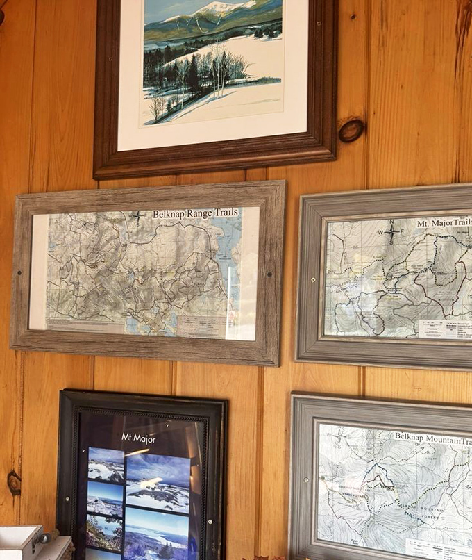 Wall d&eacute;cor featuring local trail maps&mdash;because after a meal this good, you might need directions for a digestive hike.
