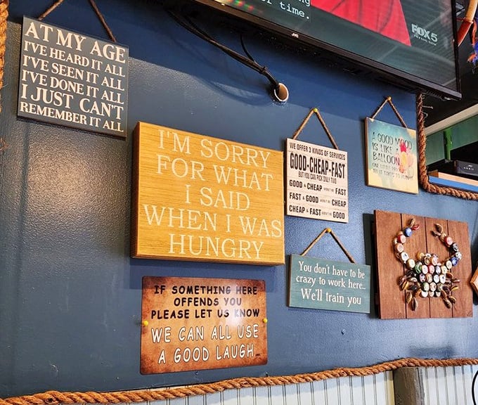 Wall signs that speak the universal truth: "I'm sorry for what I said when I was hungry" has never been more relevant than before crab feast.