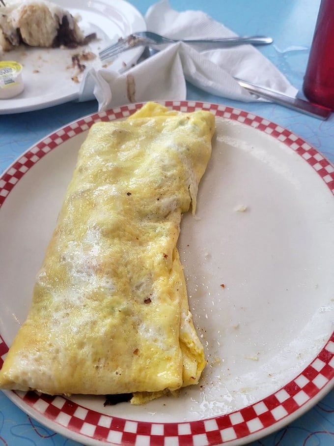 An omelet so perfectly executed it looks like it should have its own Instagram account. Folded with the precision of origami.