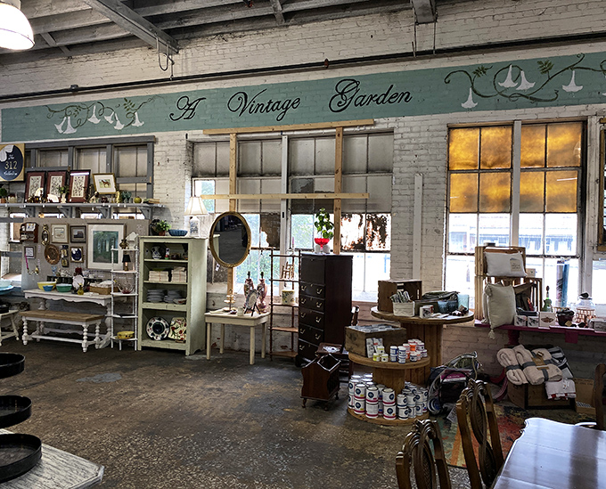 "A Vintage Garden" indeed! This charming corner blends shabby chic furniture with garden-inspired accessories for instant cottage vibes.