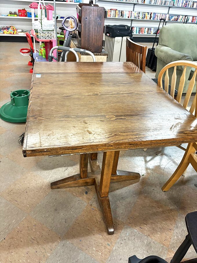 This oak dining table has hosted countless family dinners and homework sessions. Now it awaits its next chapter of spilled milk.