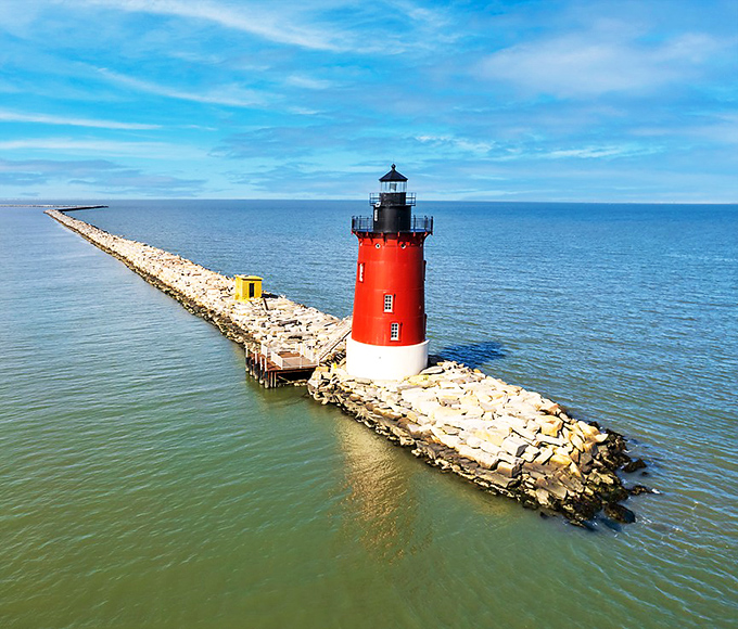 The aerial view reveals what boat captains have known for generations&mdash;this red beacon isn't just functional, it's Delaware's most photogenic maritime celebrity. 