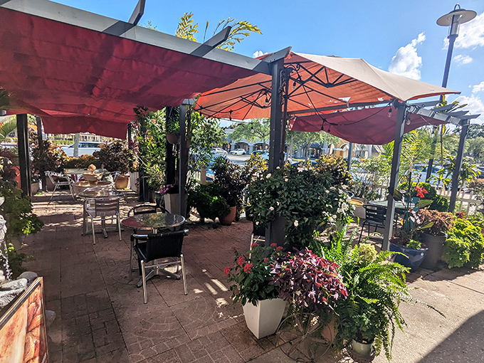 This garden patio offers a tranquil escape from shopping marathons, where coffee and conversation restore depleted energy reserves.