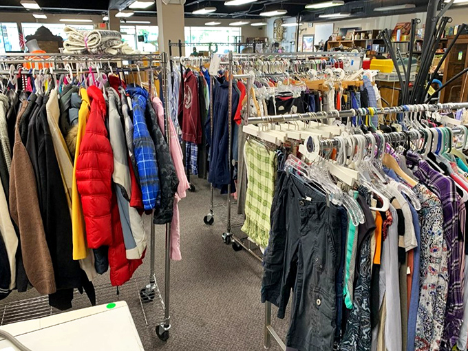 Clothing racks bursting with potential new identities. That vintage plaid flannel might have once attended Woodstock or just last week's PTA meeting.
