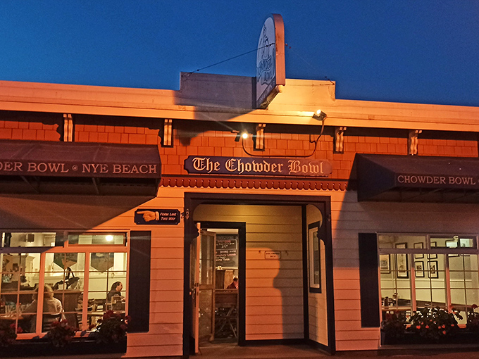Nighttime at the Chowder Bowl glows with promise. Like a lighthouse for hungry travelers, it beckons with the warm assurance of comfort food ahead.